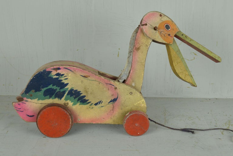 Vintage Pull Along Toy Pelican on Wheels, 1930s at 1stDibs