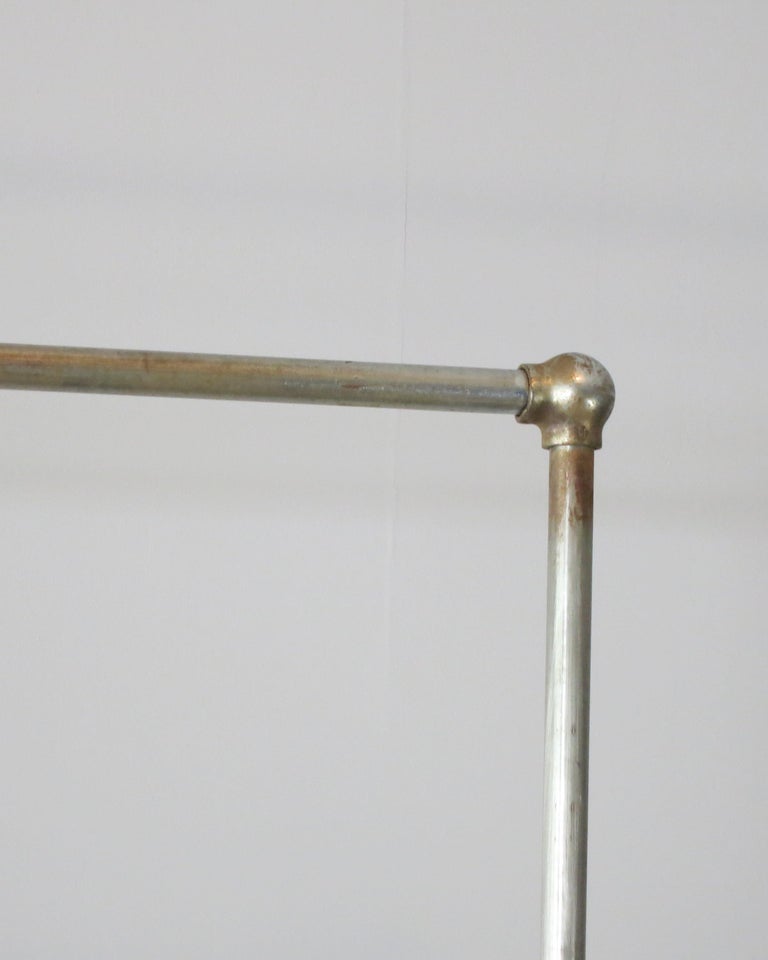 Vintage Rolling Garment Rack Clothes Rack For Sale at 1stDibs