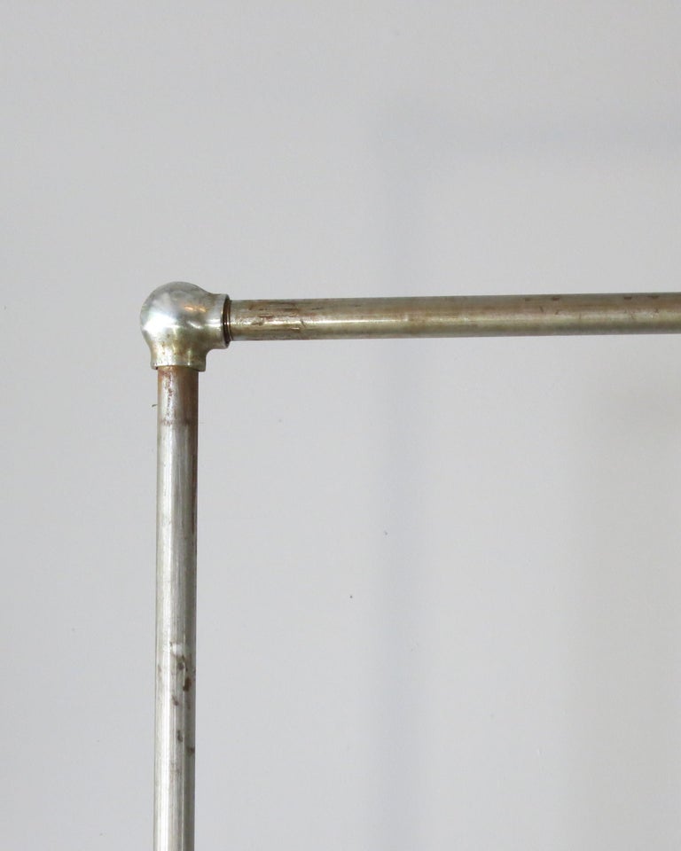 Vintage Rolling Garment Rack Clothes Rack For Sale at 1stDibs