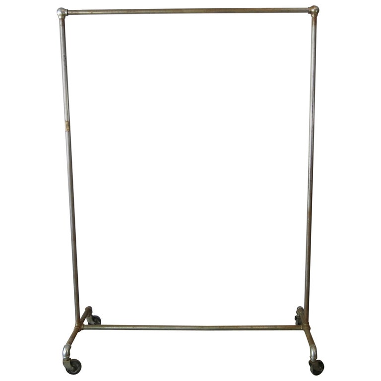 Vintage Rolling Garment Rack Clothes Rack For Sale at 1stDibs