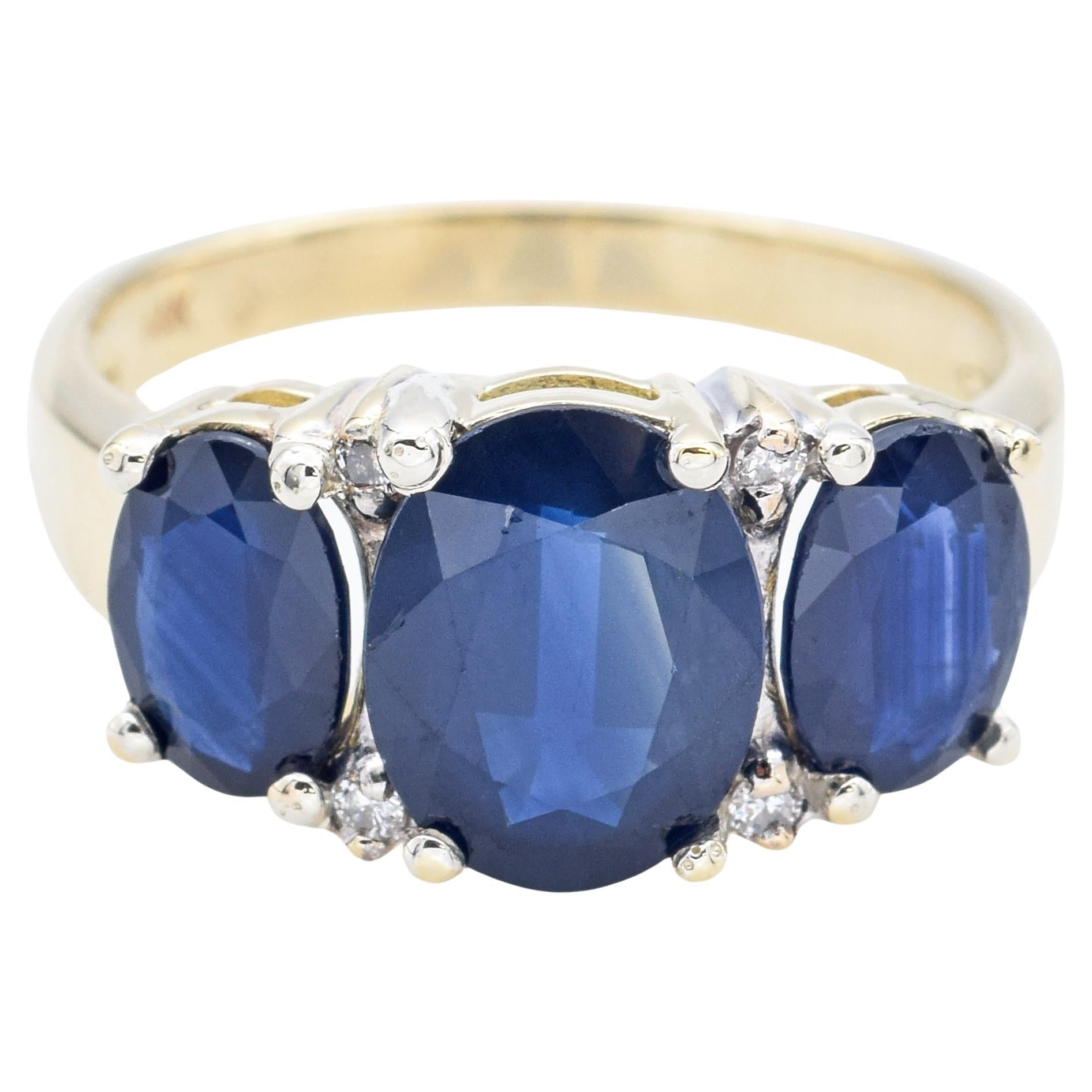 Antique Gold, Cabochon Sapphire, and Diamond Three-Stone Flush-Set Ring ...