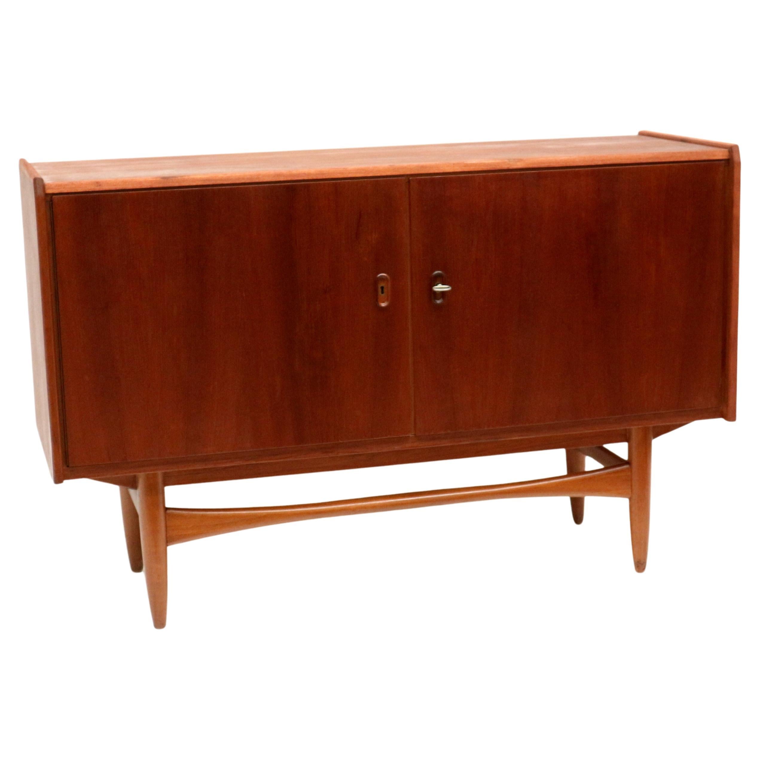 Vintage sideboard with 2 doors on a beautiful base made in the 60s For ...