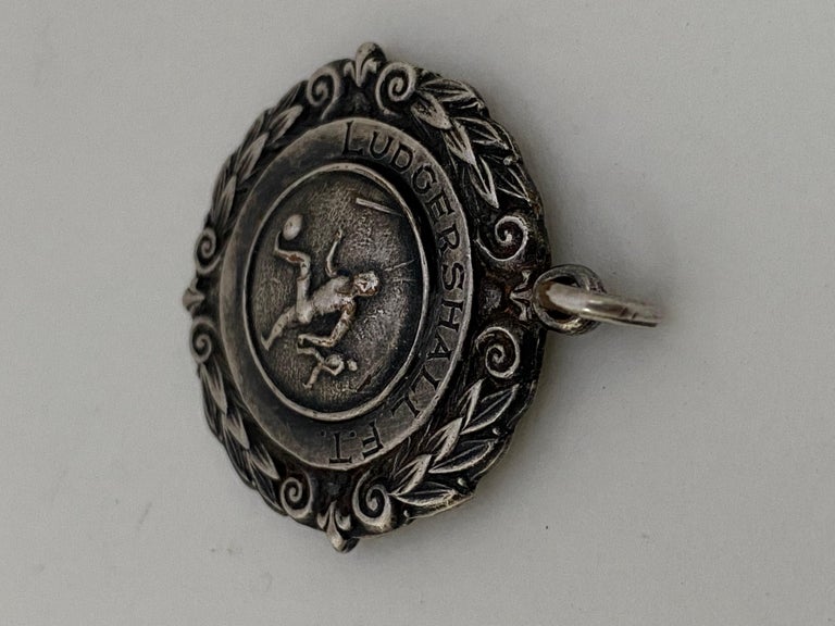 Vintage Silver Plated Football Medal Pendant For Sale at 1stDibs