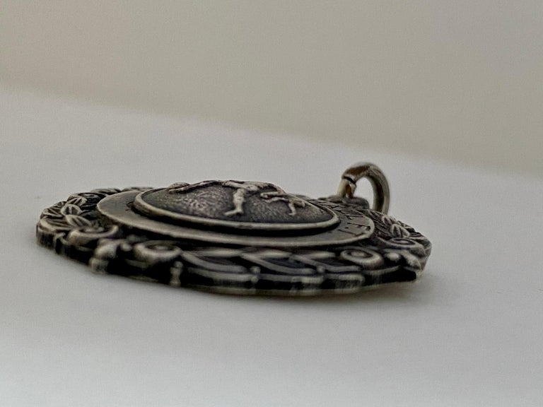 Vintage Silver Plated Football Medal Pendant For Sale at 1stDibs