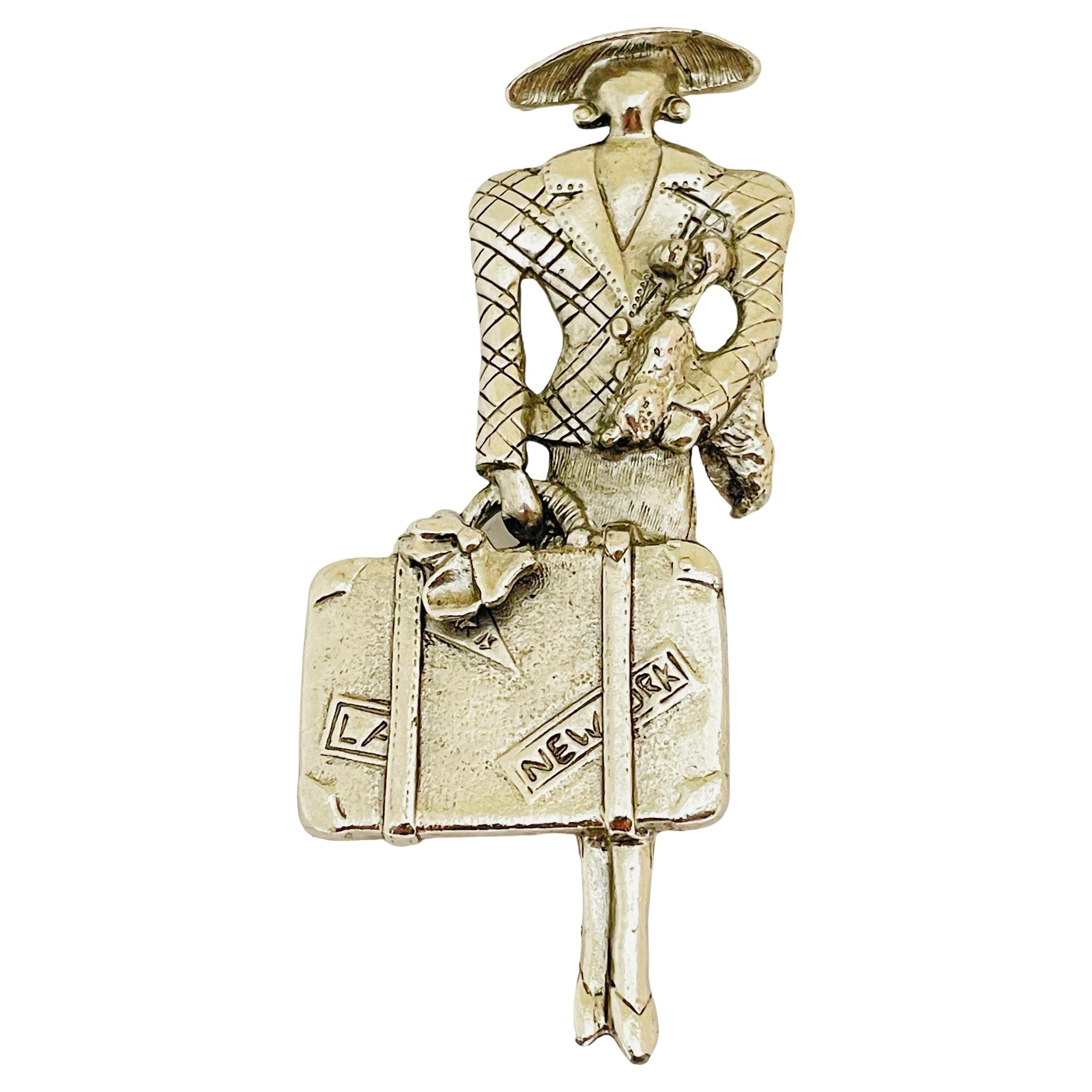 Vintage silver tone travel lade designer runway brooch at 1stDibs