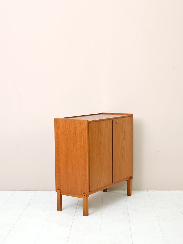 Vintage teak sideboard cabinet at 1stDibs