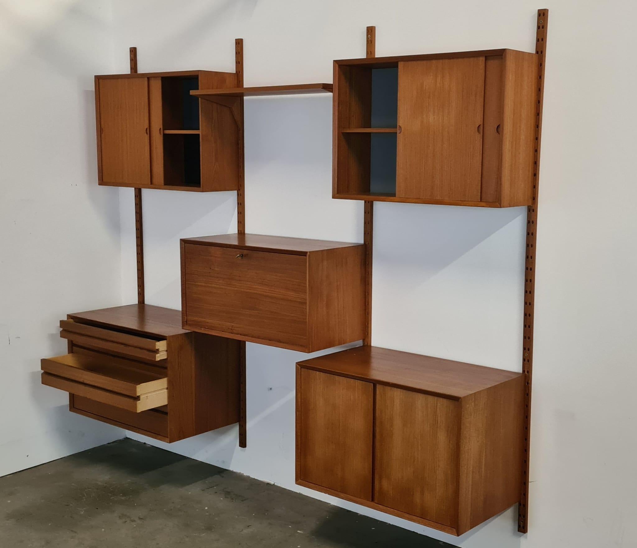 Vintage teak wall unit by Paul Cadovius, 1960s at 1stDibs