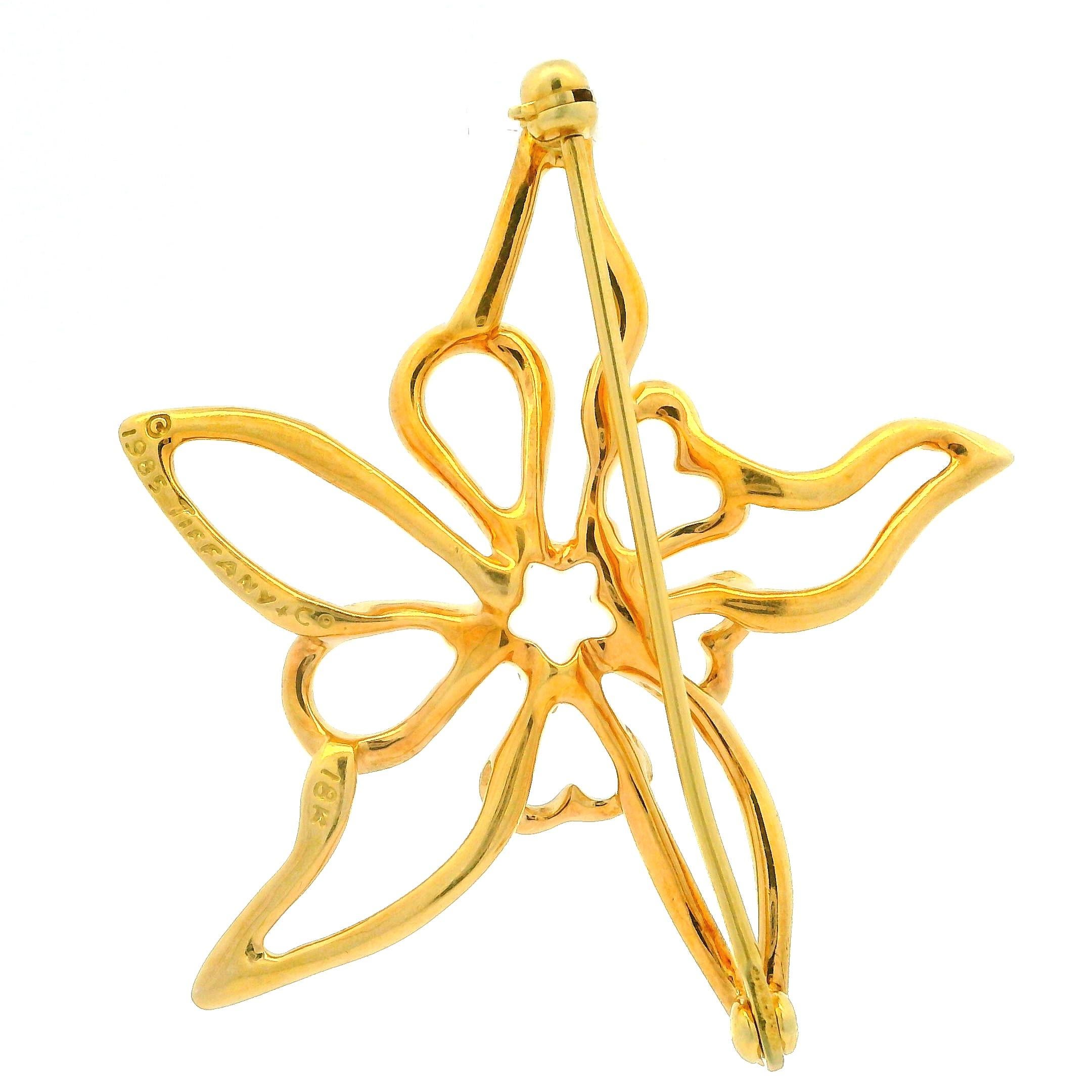 Vintage Tiffany and Co. 1985 Solid 18k Yellow Gold Open Work Star Pin Brooch For Sale at 1stDibs