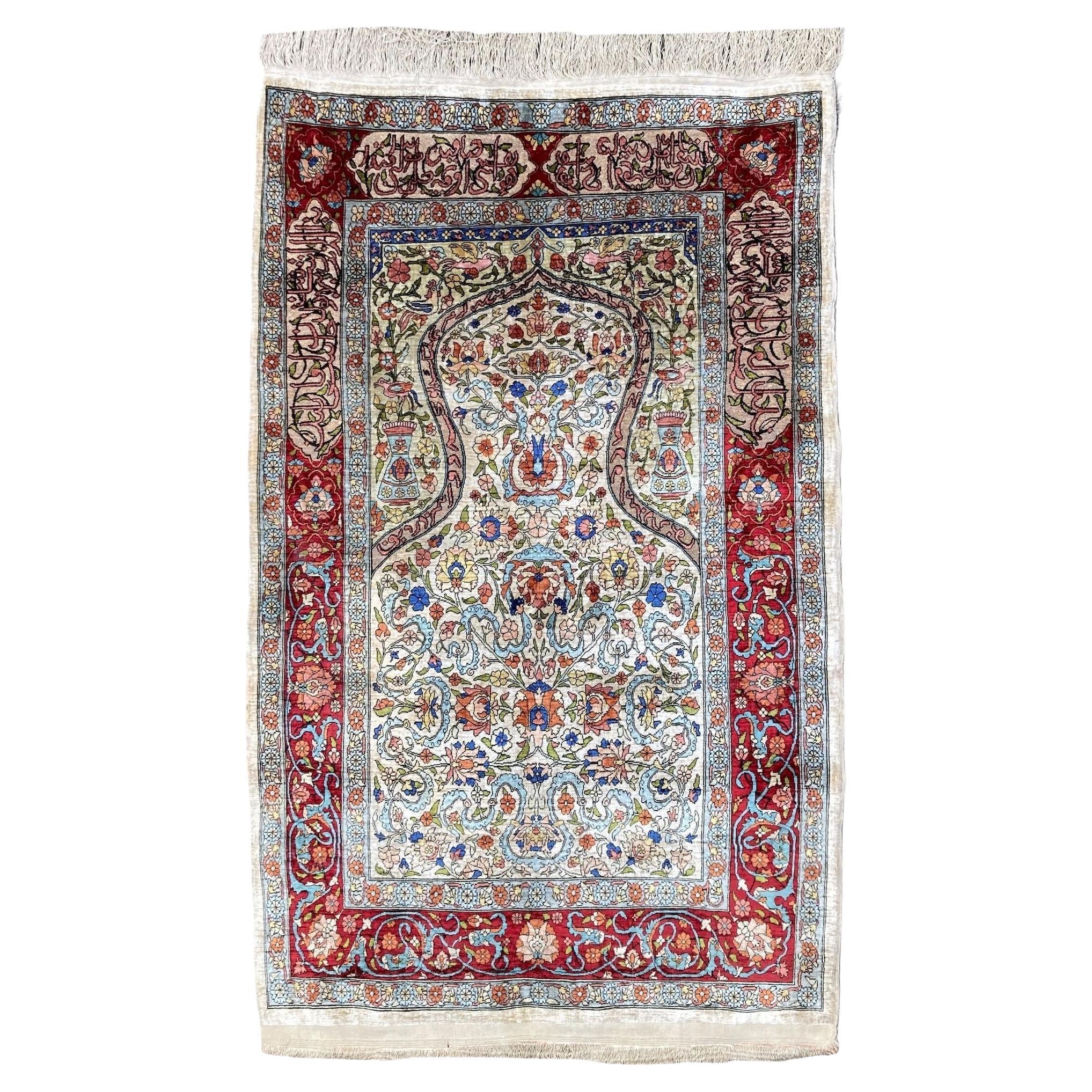 Vintage Mille Fleurs Hereke Turkish rug at 1stDibs