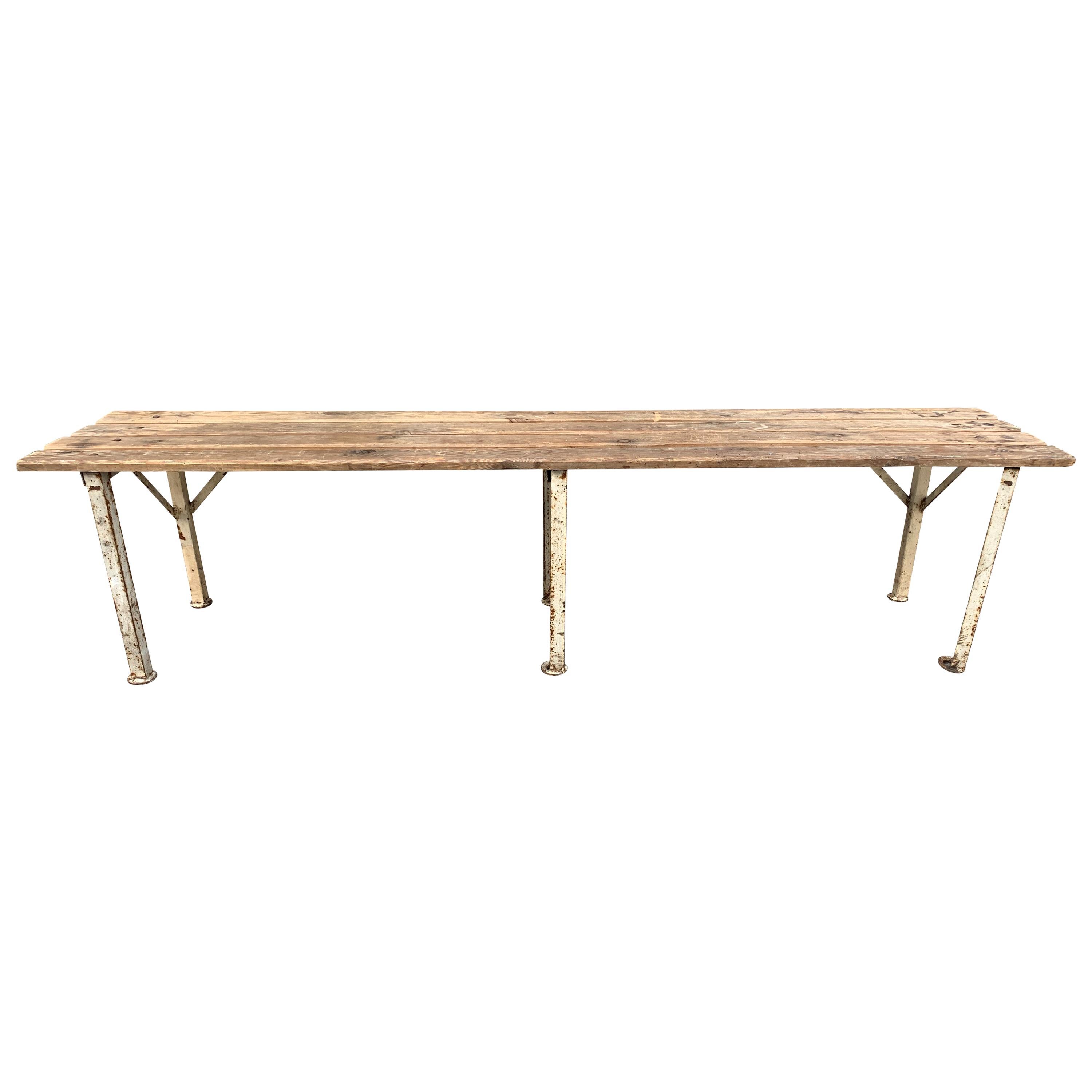 Vintage metal bench covered in 100 year old kilm rug at 1stDibs