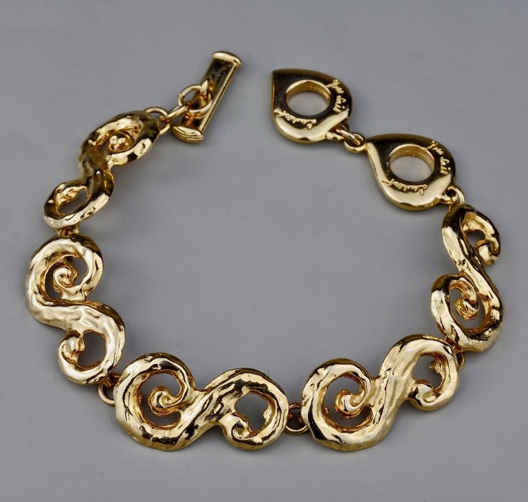 Vintage YVES SAINT LAURENT Arabesque Hammered Bracelet For Sale at 1stDibs