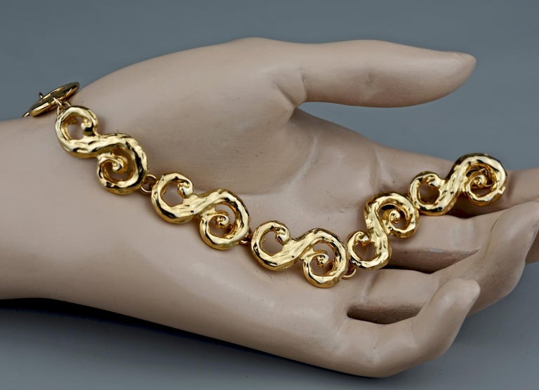 Vintage YVES SAINT LAURENT Arabesque Hammered Bracelet For Sale at 1stDibs