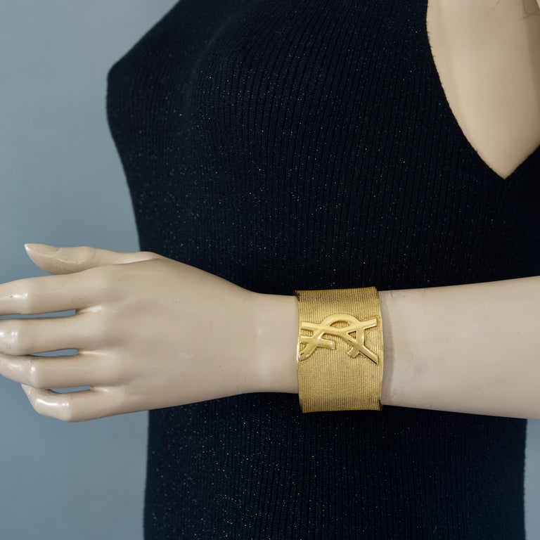 Vintage YVES SAINT LAURENT Ysl Logo Asymmetric Cuff Bracelet at 1stDibs