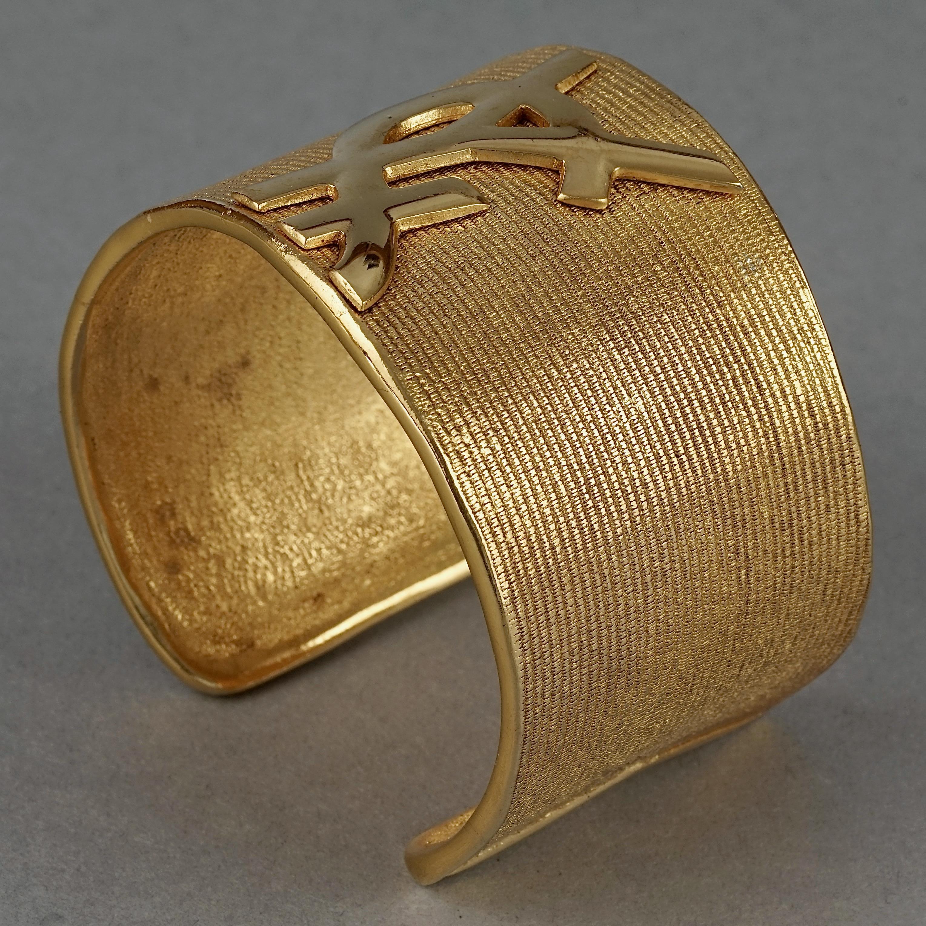 Vintage YVES SAINT LAURENT Ysl Logo Asymmetric Cuff Bracelet at 1stDibs ...