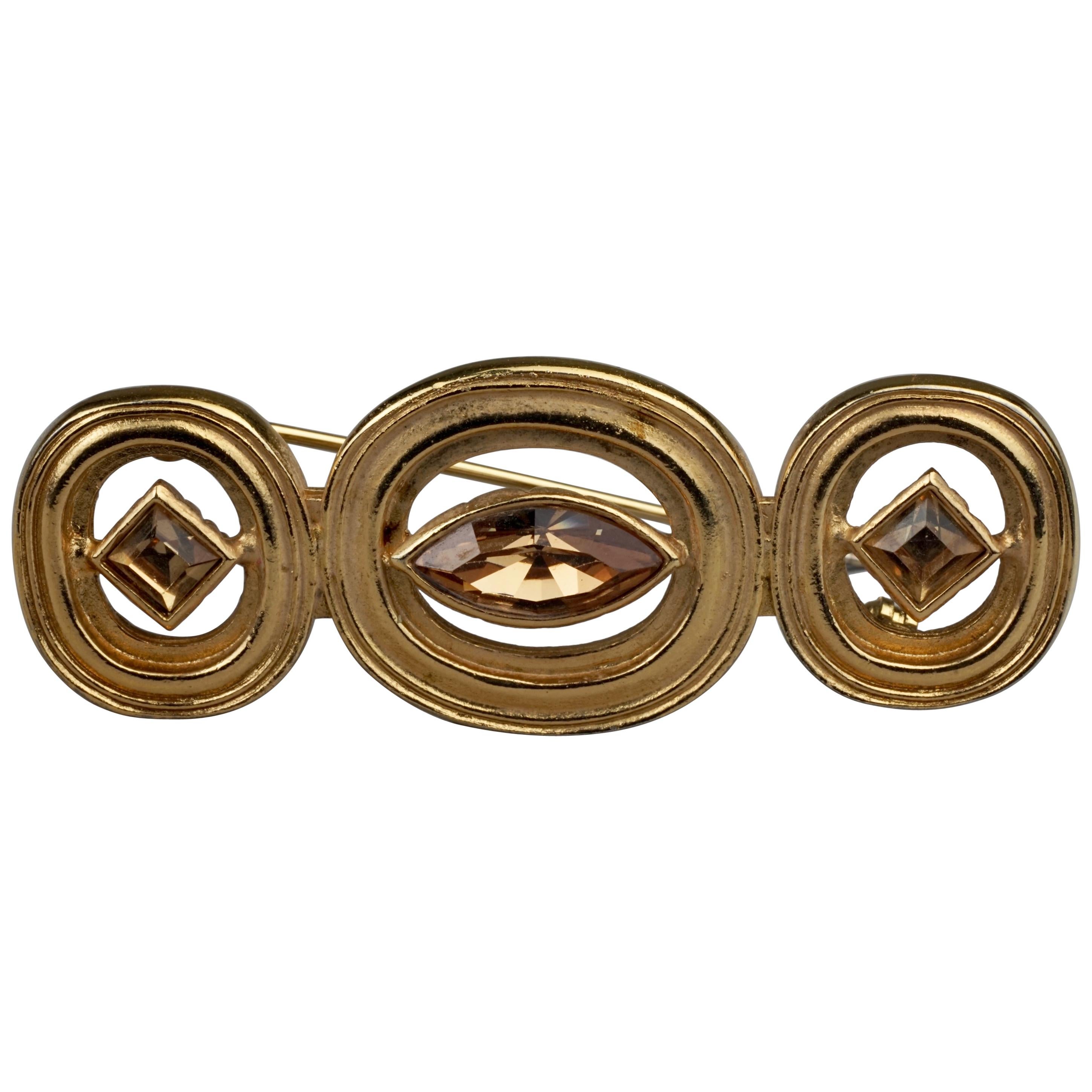 Yves Saint Laurent/YSL Gold Tone Logo Pin at 1stDibs | ysl lapel pin ...