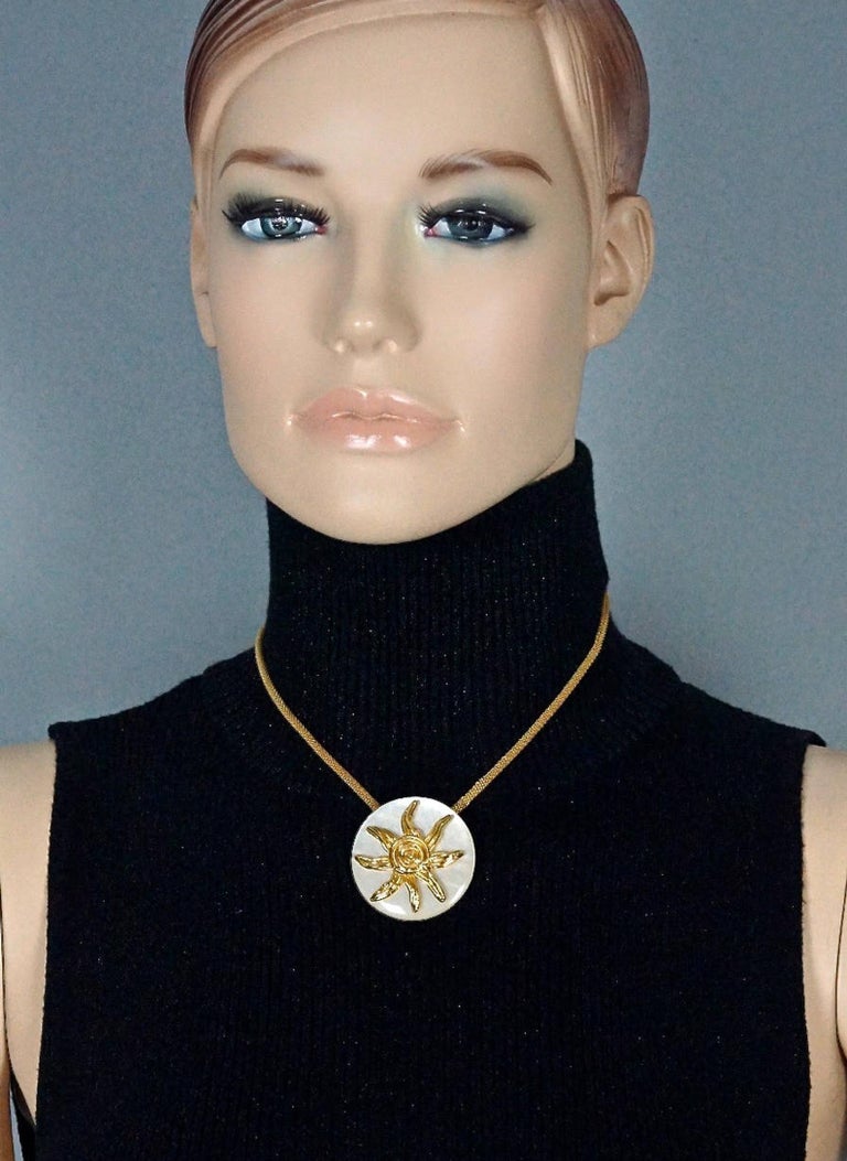 Vintage YVES SAINT LAURENT Ysl Sun Spiral Pearly White Medallion Disc ...
