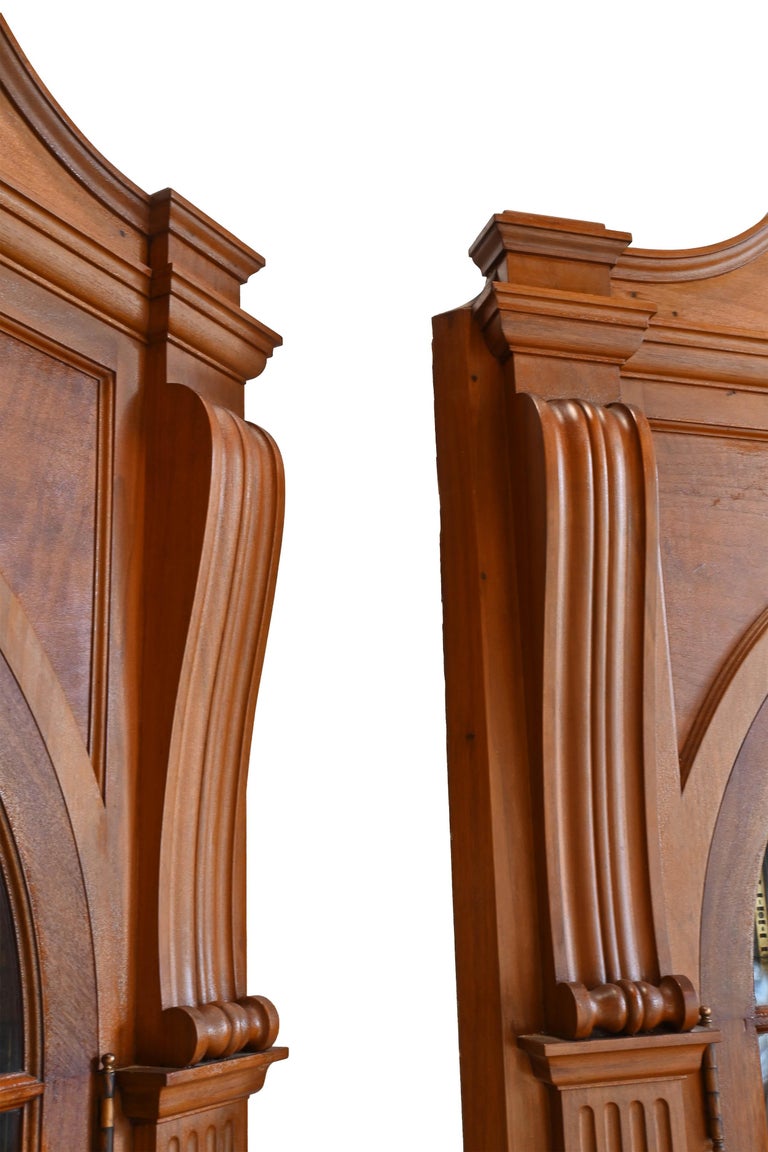 Walnut Corner Cabinet with Arched Window and Urn Finial at 1stDibs