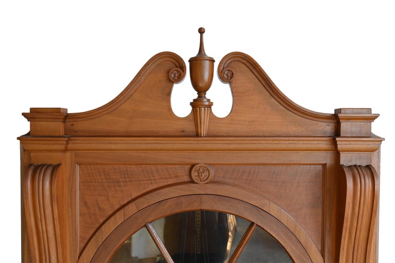 Walnut Corner Cabinet with Arched Window and Urn Finial at 1stDibs