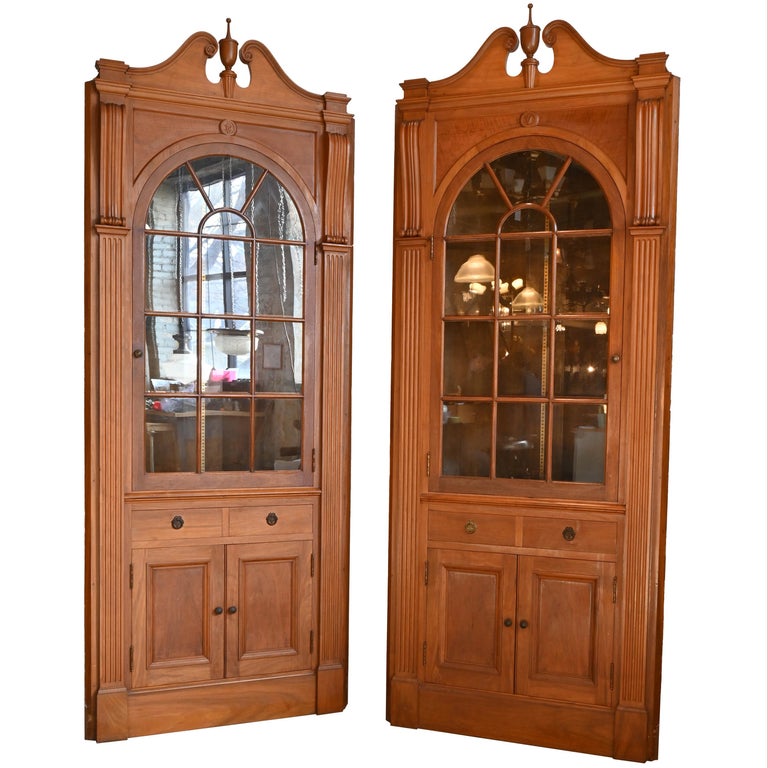 Walnut Corner Cabinet with Arched Window and Urn Finial at 1stDibs