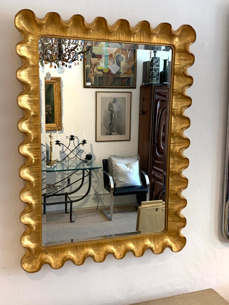 Carved Giltwood Wave Moderne Mirror, by Carver's Guild For Sale at 1stDibs