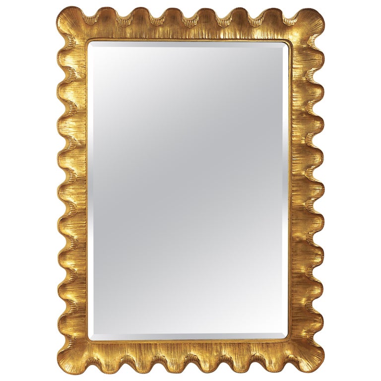 Carved Giltwood Wave Moderne Mirror, by Carver's Guild For Sale at 1stDibs
