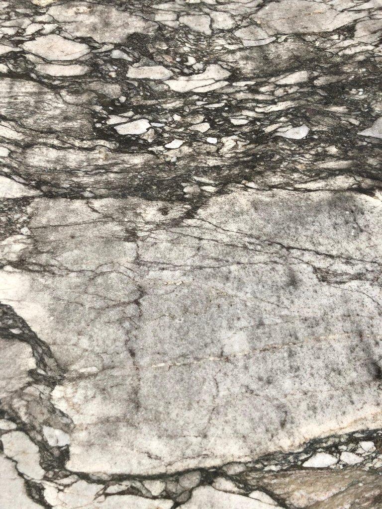 Weathered Marble-Top Iron Patio Table at 1stDibs