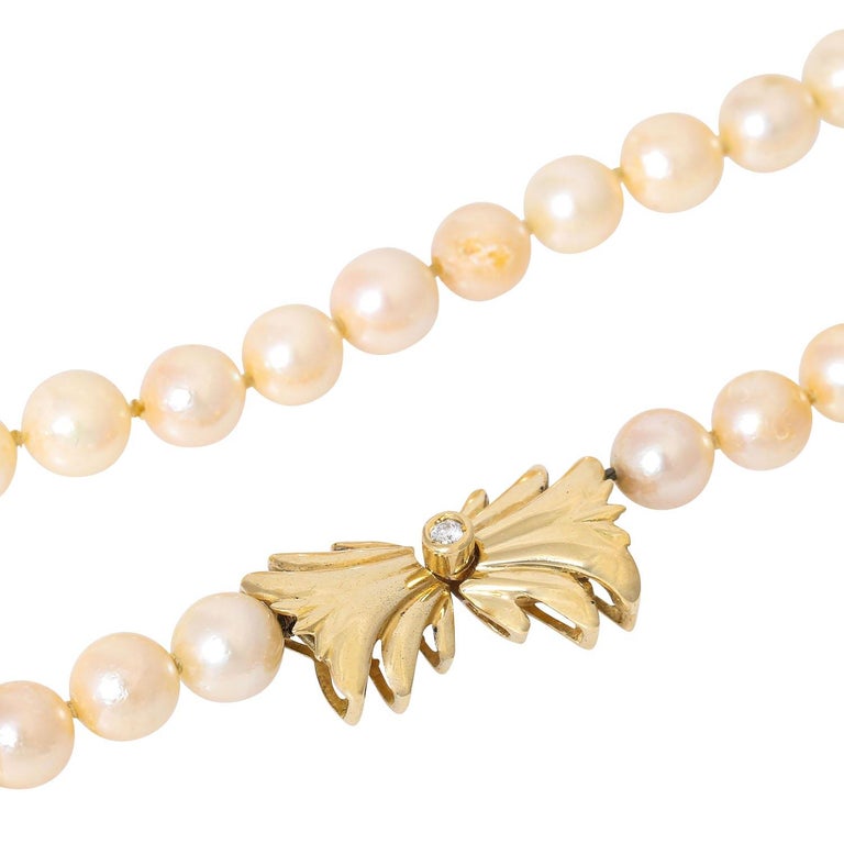 WEMPE Pearl Necklace with a Decorative Loop Clasp For Sale at 1stDibs