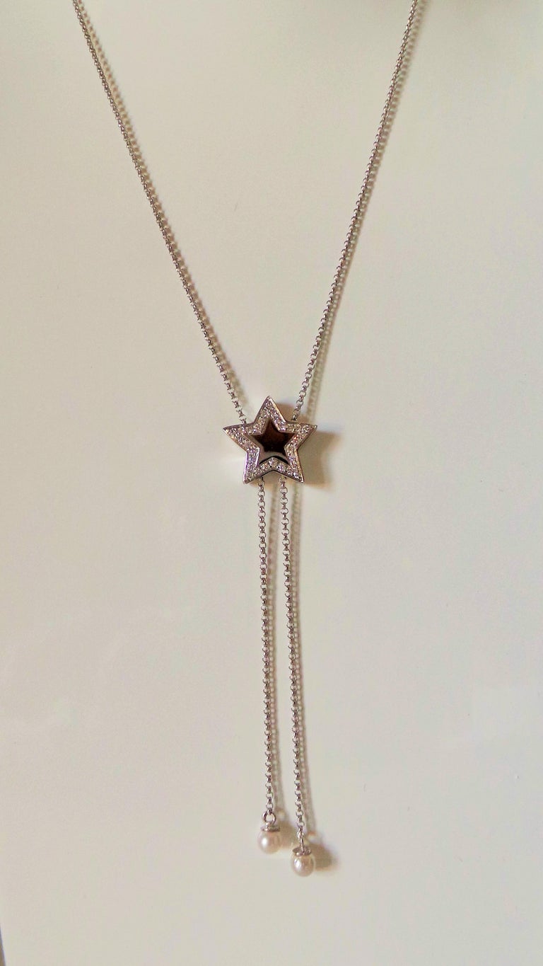 White Gold 0.30K White Diamonds Star Moving Pendant Necklace For Sale ...