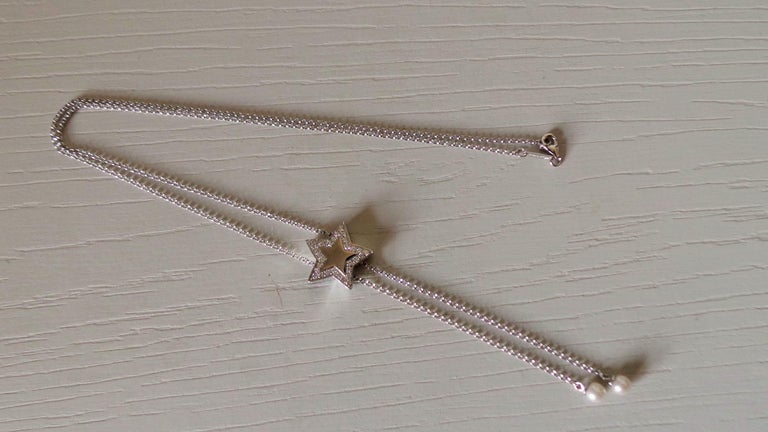 White Gold 0.30K White Diamonds Star Moving Pendant Necklace For Sale ...