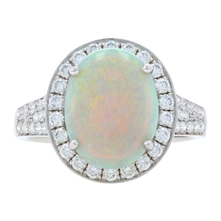 White Gold Opal and Diamond Halo Ring, 14k Oval Cabochon Cut 1.37ctw For Sale at 1stDibs