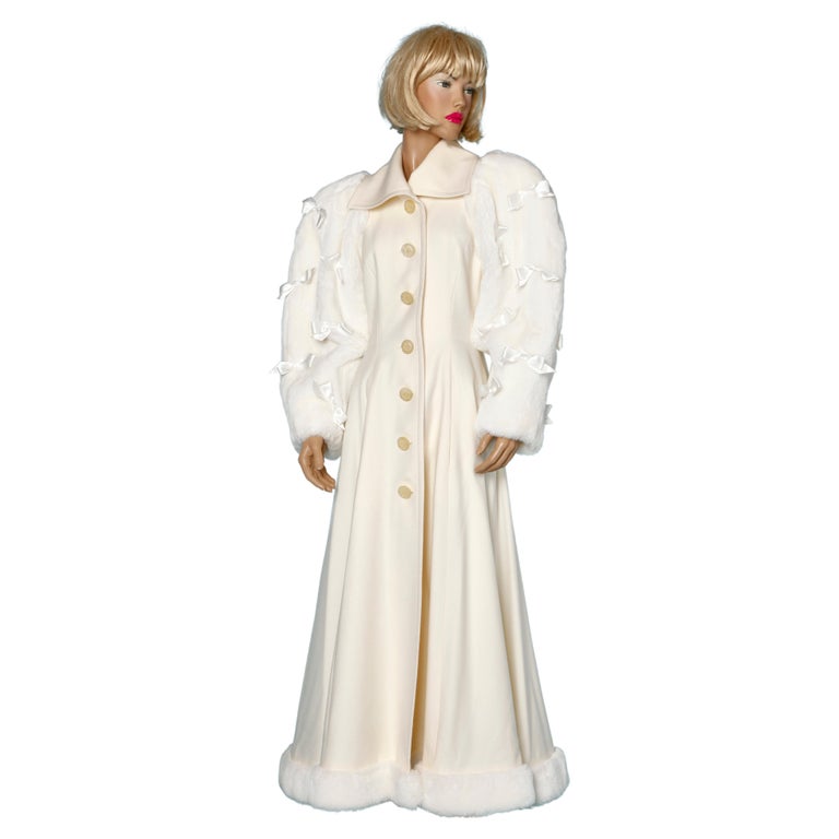 White long coat in off-white wool and puffy sleeves with satin bow ...