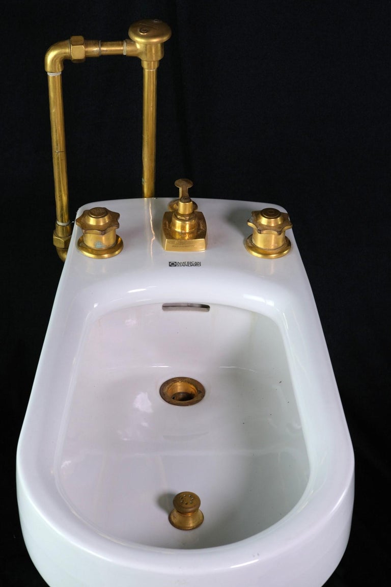 White Porcelain Bidet with Gold Plated Hardware by American Standard ...