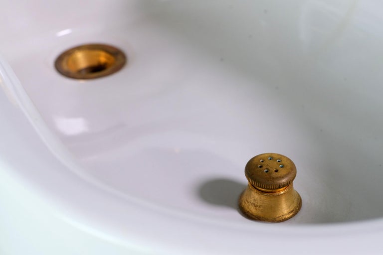 White Porcelain Bidet with Gold Plated Hardware by American Standard ...