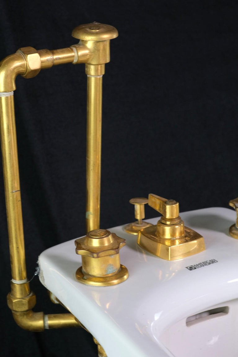 White Porcelain Bidet with Gold Plated Hardware by American Standard ...