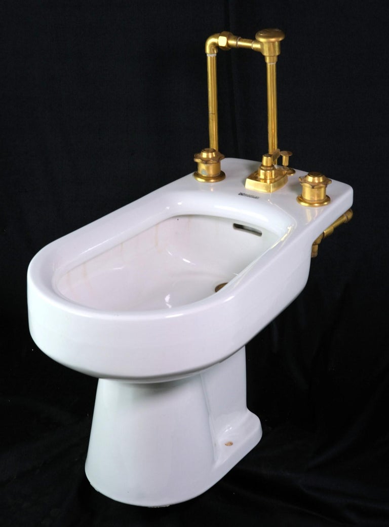 White Porcelain Bidet with Gold Plated Hardware by American Standard ...