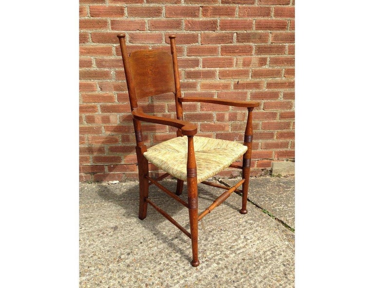 William Birch, an Arts and Crafts Oak Rush Seat Armchair ...