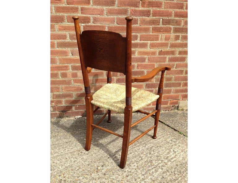 William Birch, an Arts and Crafts Oak Rush Seat Armchair ...