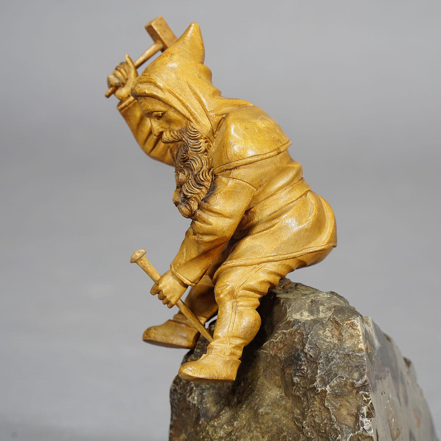 Wooden Carved Black Forest Dwarf Sitting on a Rock For Sale at 1stDibs
