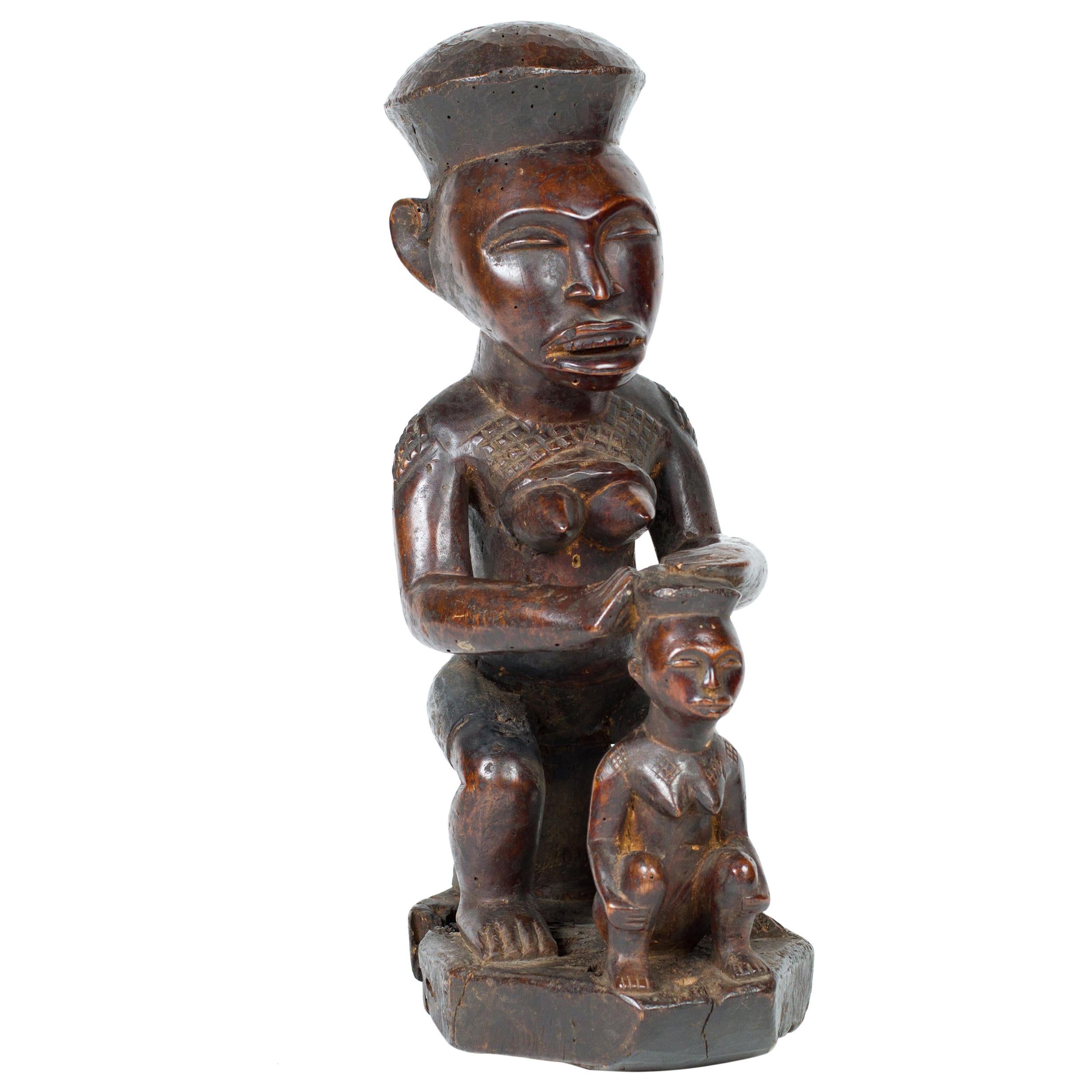 African Asanta Tribe Statue of Mother Feeding Child at 1stDibs