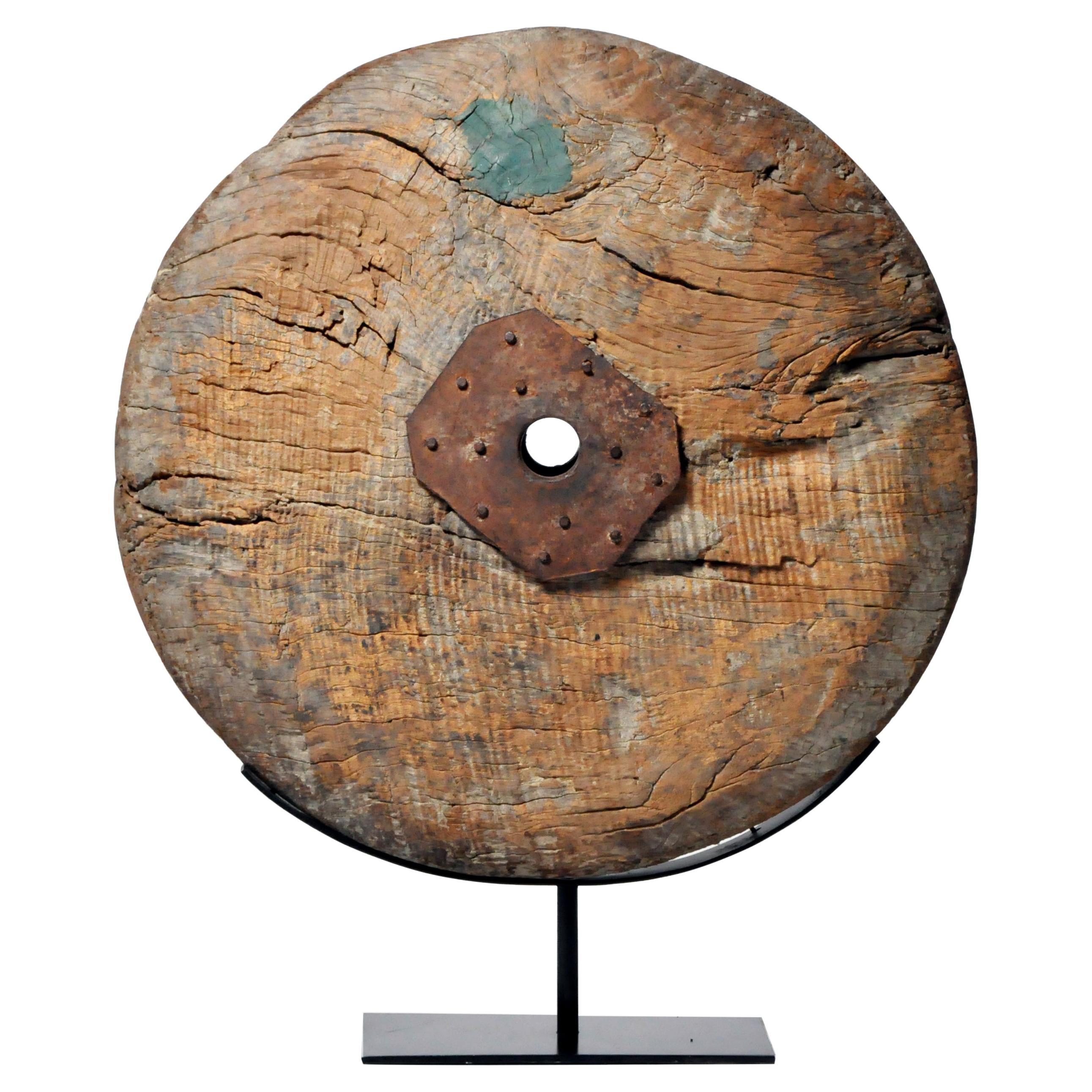 Wooden Wheel on Metal Stand at 1stDibs
