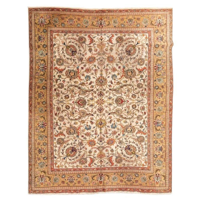 Wool rug. Classic Tabriz design with yellows and golds. 3.75 x 2.90m ...