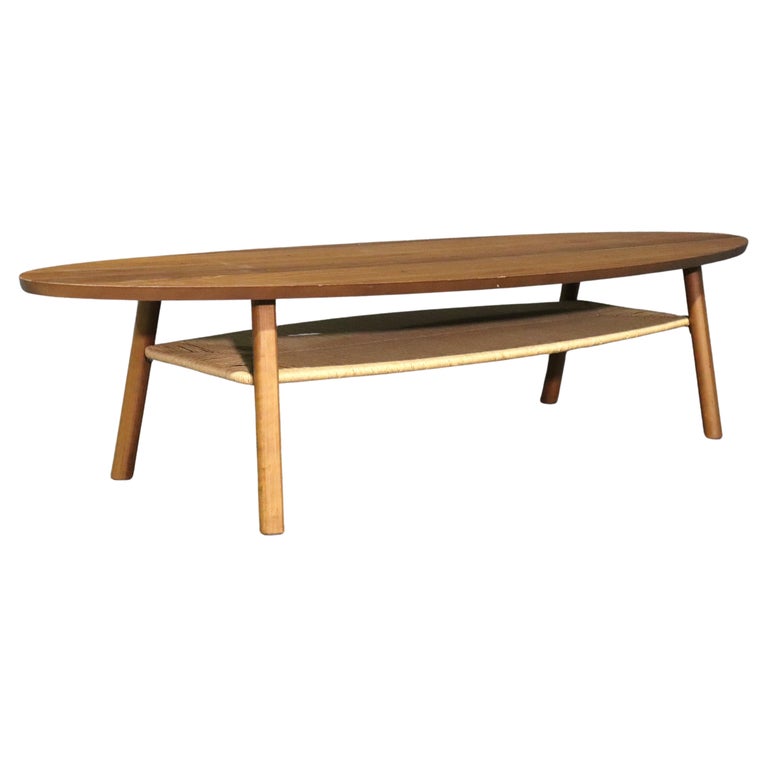 Woven Shelf Oval Coffee Table For Sale at 1stDibs