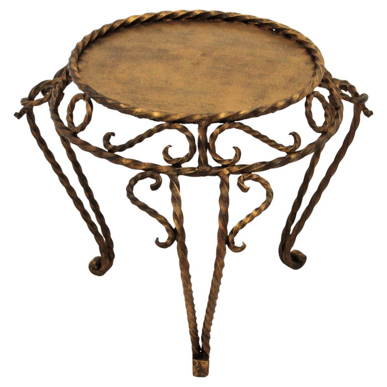 Wrought Iron Gilt Table with Twisted Details at 1stDibs