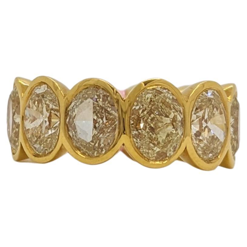Eternity band in 18K YG with Rounds and Fancy Yellow Oval Diamonds. D3 ...