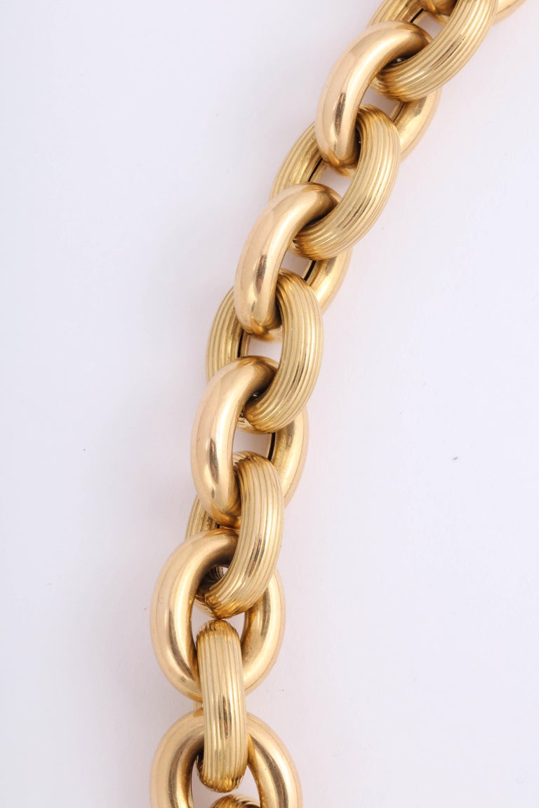 Yellow Gold Polished and Striated Oval Link Chain at 1stDibs