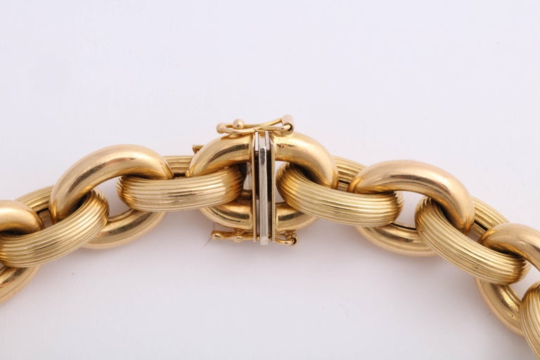 Yellow Gold Polished and Striated Oval Link Chain at 1stDibs