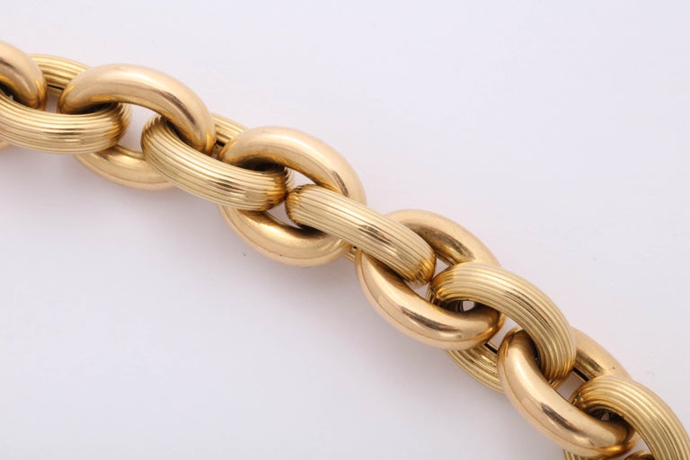 Yellow Gold Polished and Striated Oval Link Chain at 1stDibs