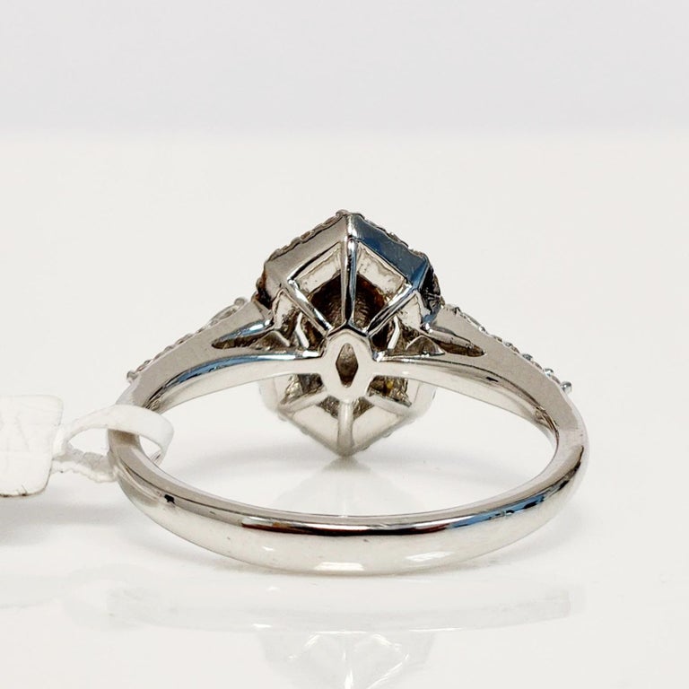 Yellow Step Cut Oval Diamond Halo Ring For Sale at 1stDibs