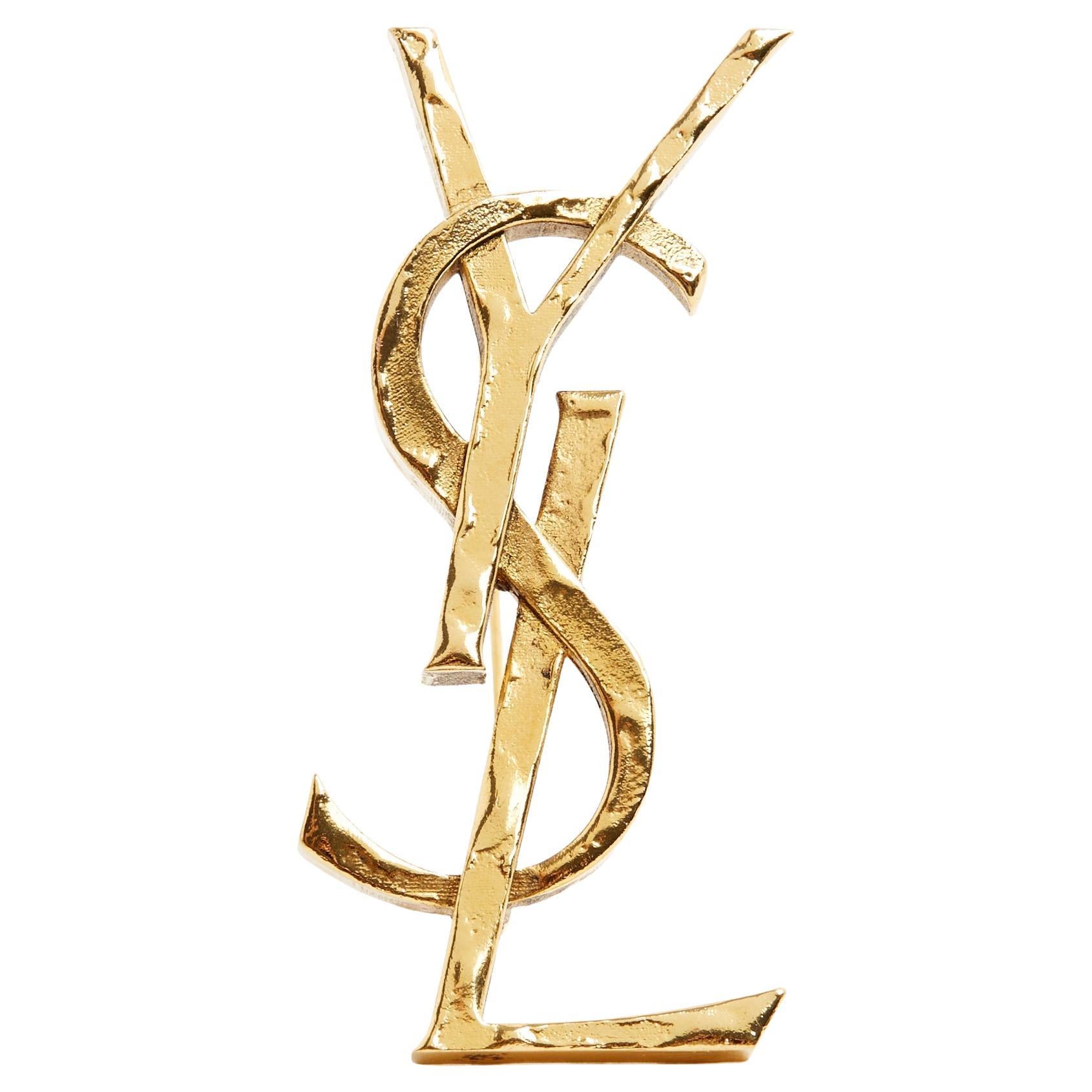 Yves Saint Laurent Gold-tone large YSL Cassandre Brooch For Sale at 1stDibs