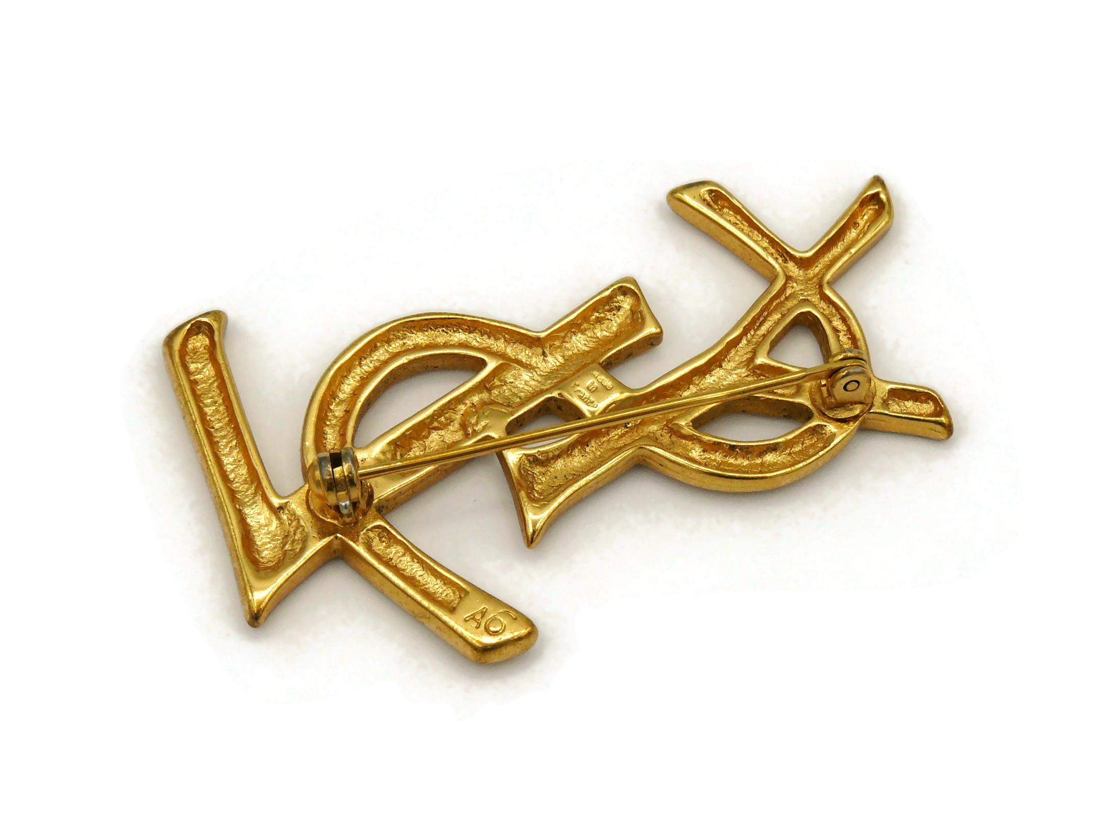 YVES SAINT LAURENT YSL Vintage Gold Tone Logo Brooch For Sale at ...